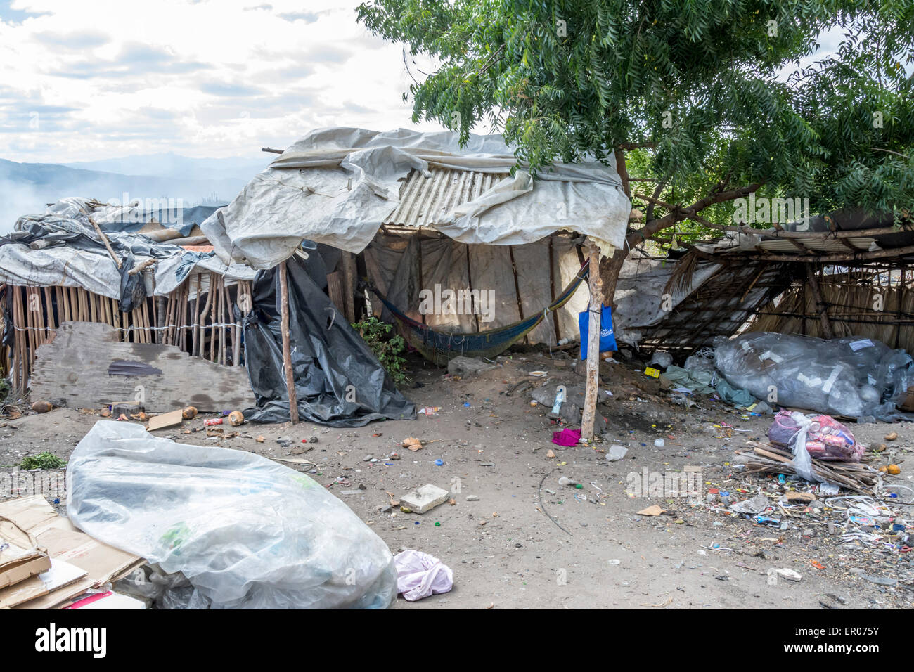 Storage hut for recyclable items collected by poor people at a garbage ...