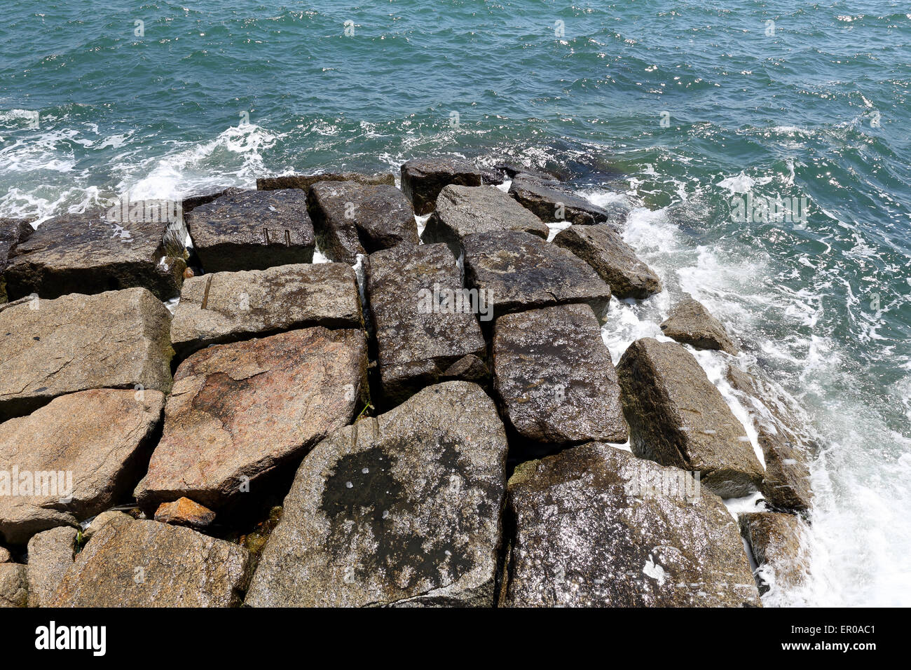 Stone breakwater for protection of coast Stock Photo - Alamy