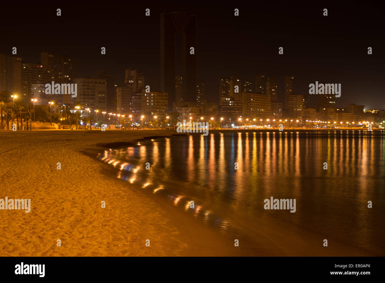 Benidorm beach and skyline at night Stock Photo - Alamy