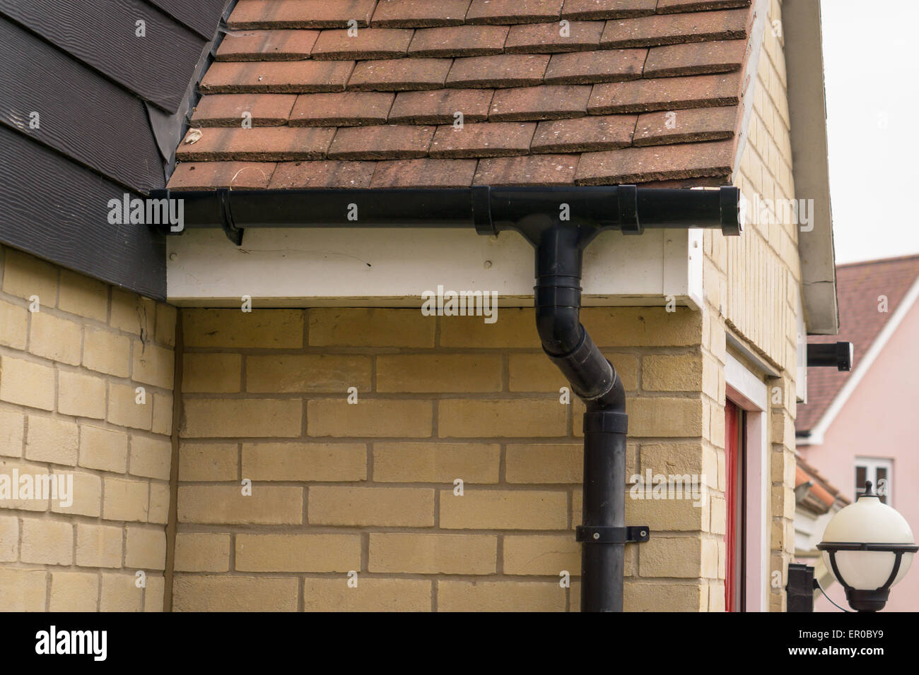 Roof Guttering horizontal view closeup Stock Photo - Alamy