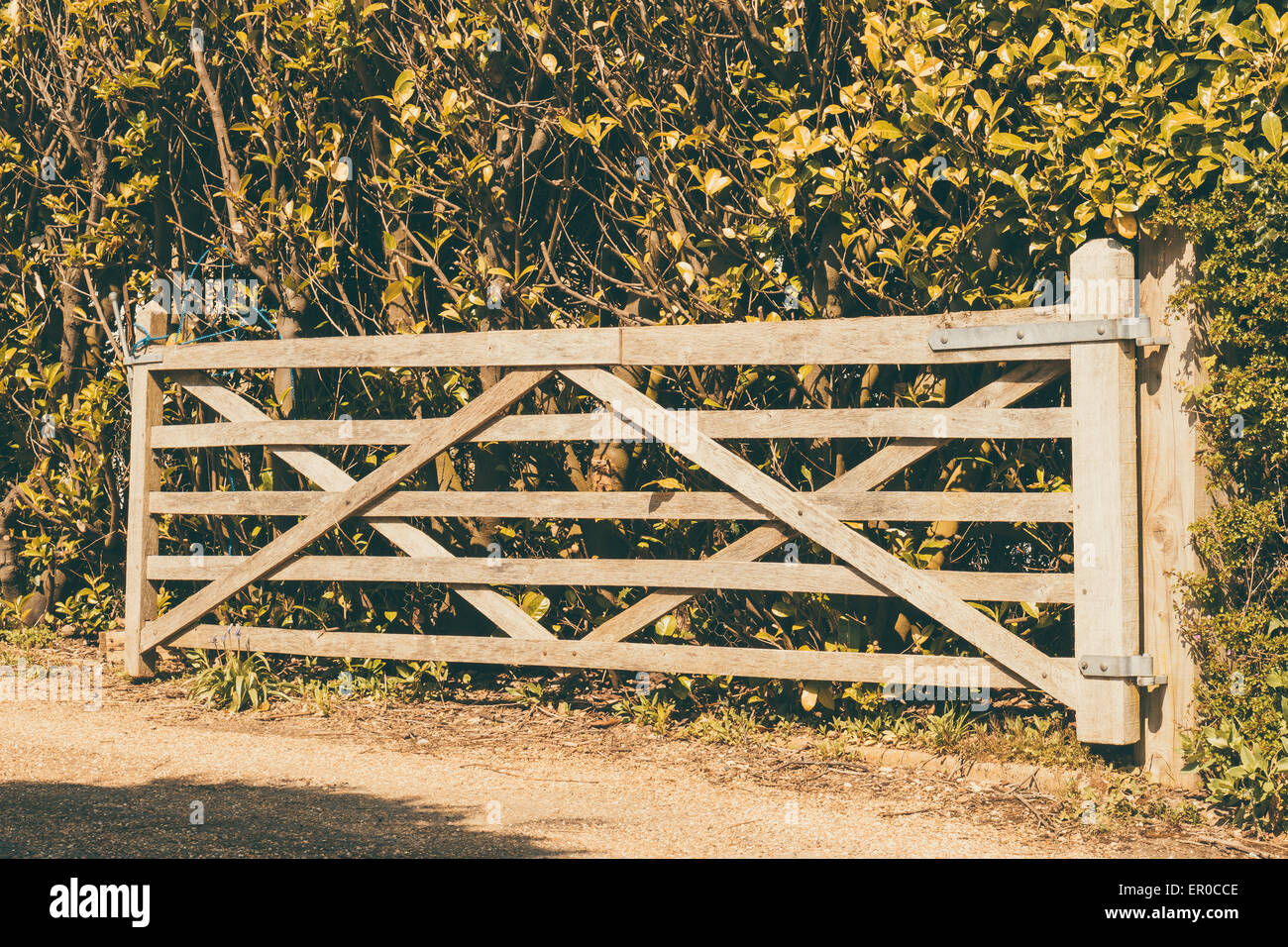 Wooden gate in rural setting closeup Stock Photo - Alamy