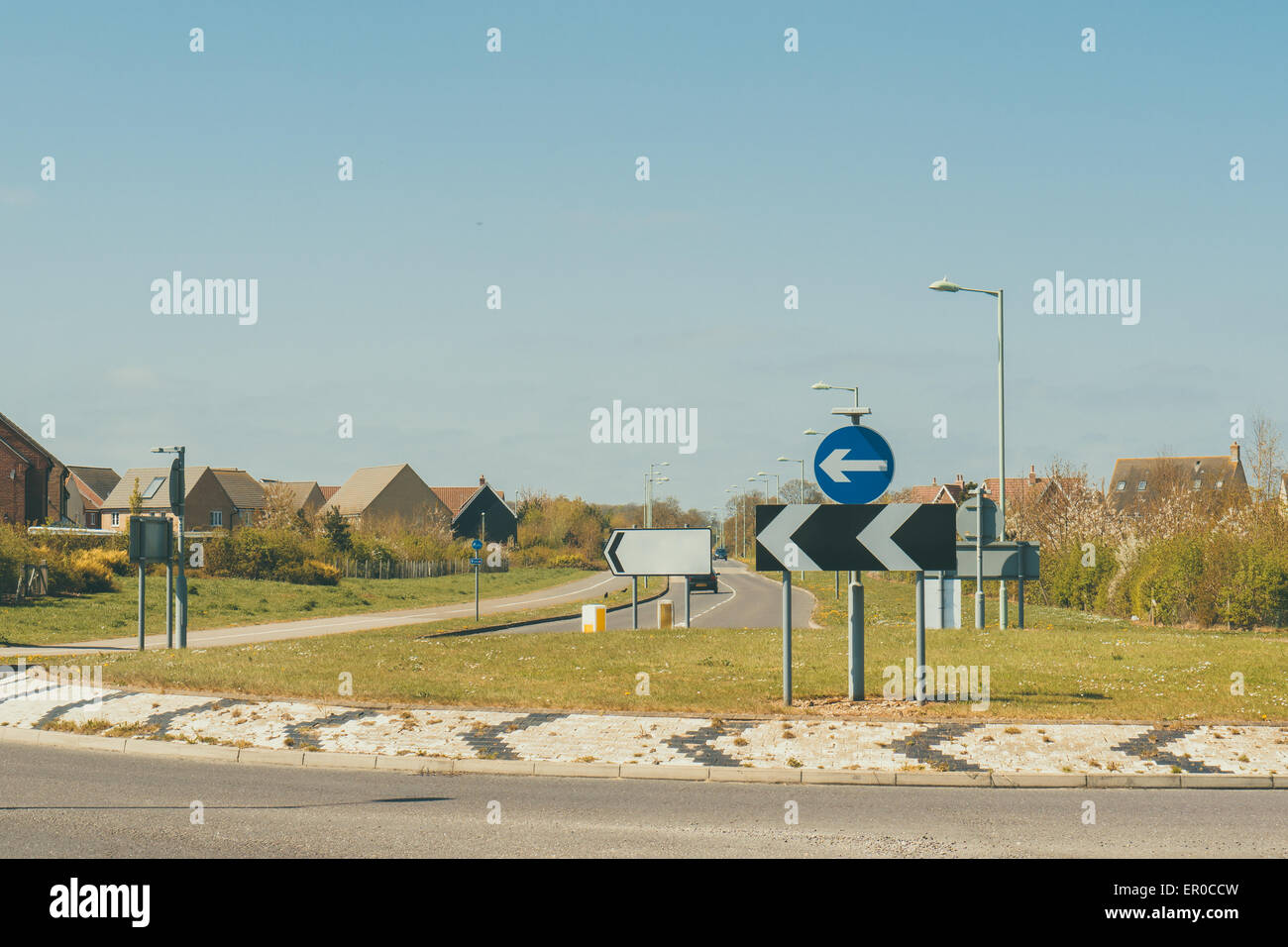 Roundabout sign on a brititish road closeup Stock Photo - Alamy
