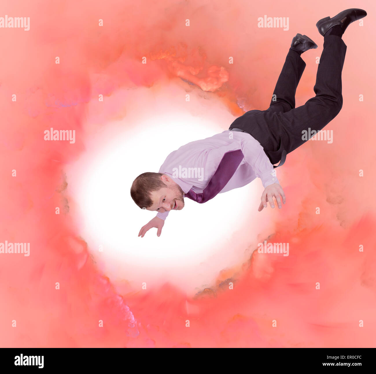 Businessman falling down over pink abstract background Stock Photo - Alamy