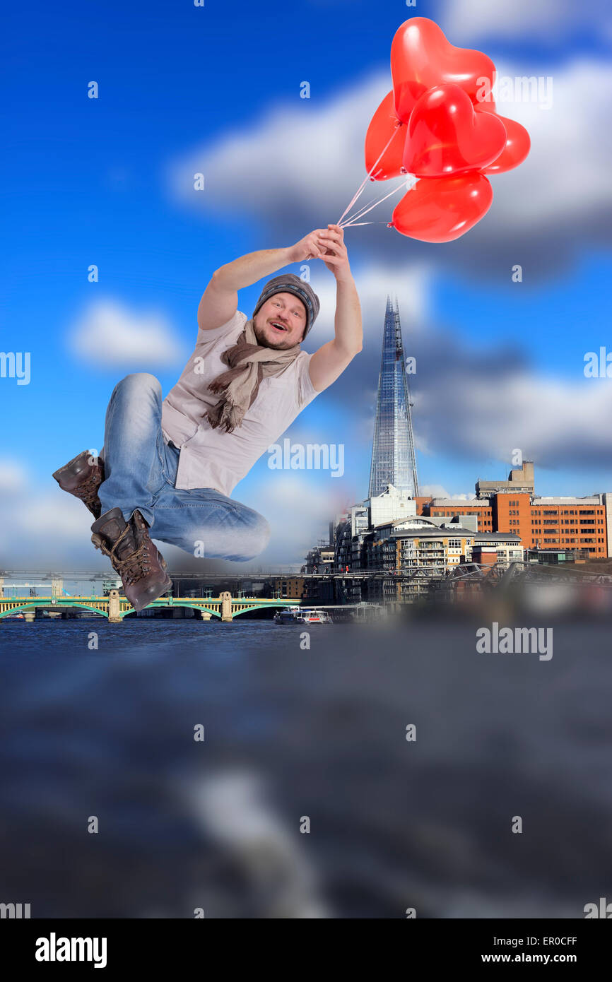 Man flying balloon hi-res stock photography and images - Alamy