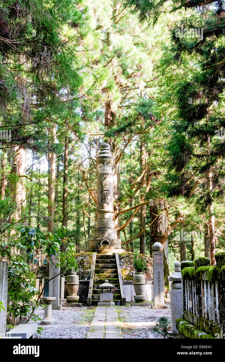 The famous Okunoin cemetery at Koyasan in Japan. Tall tomb memorial at ...
