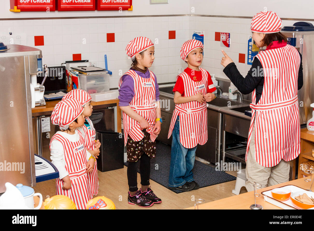 Children's activity centre Kidzania in Nishinomiya, Japan. Group of ...