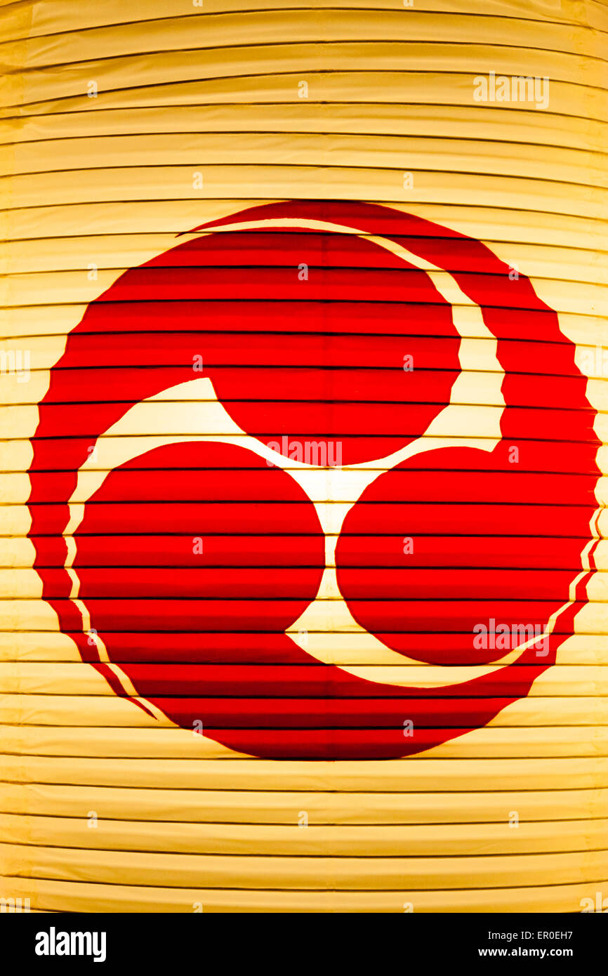 Close up of of illuminated Japanese Shinto paper lantern, Chochin, with ...