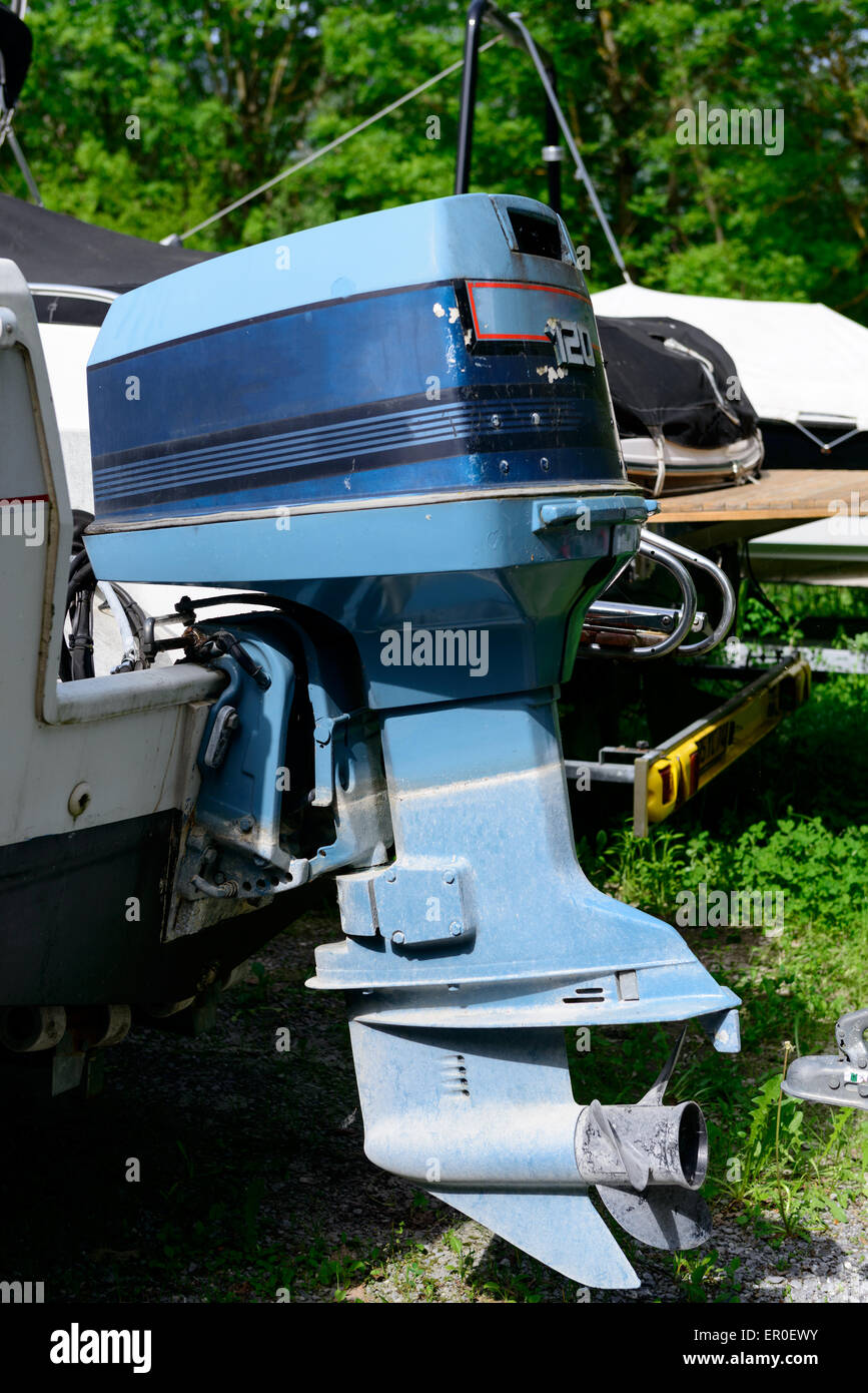 a blue outboard engine with a propeller Stock Photo - Alamy