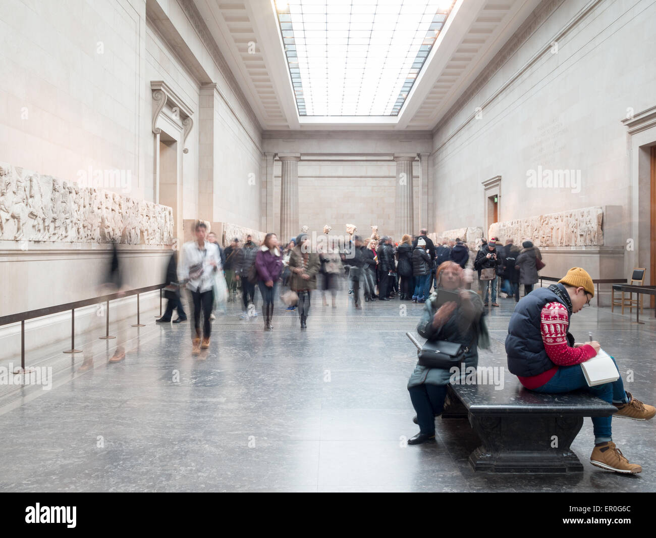 Visitors movement at the Greek panels room of the British Museum Stock ...