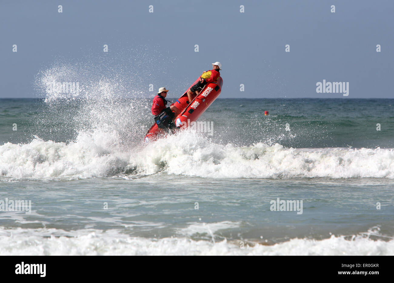 Surf lifesavers with inflatable rescue boat (IRB) on the surf coast in ...