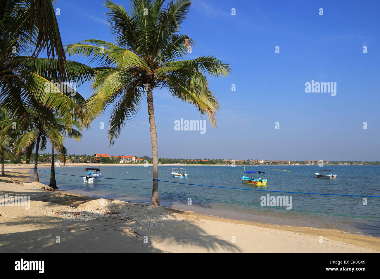 Ocean and sandy tropical beach at Pasikudah Bay, Eastern Province, Sri ...