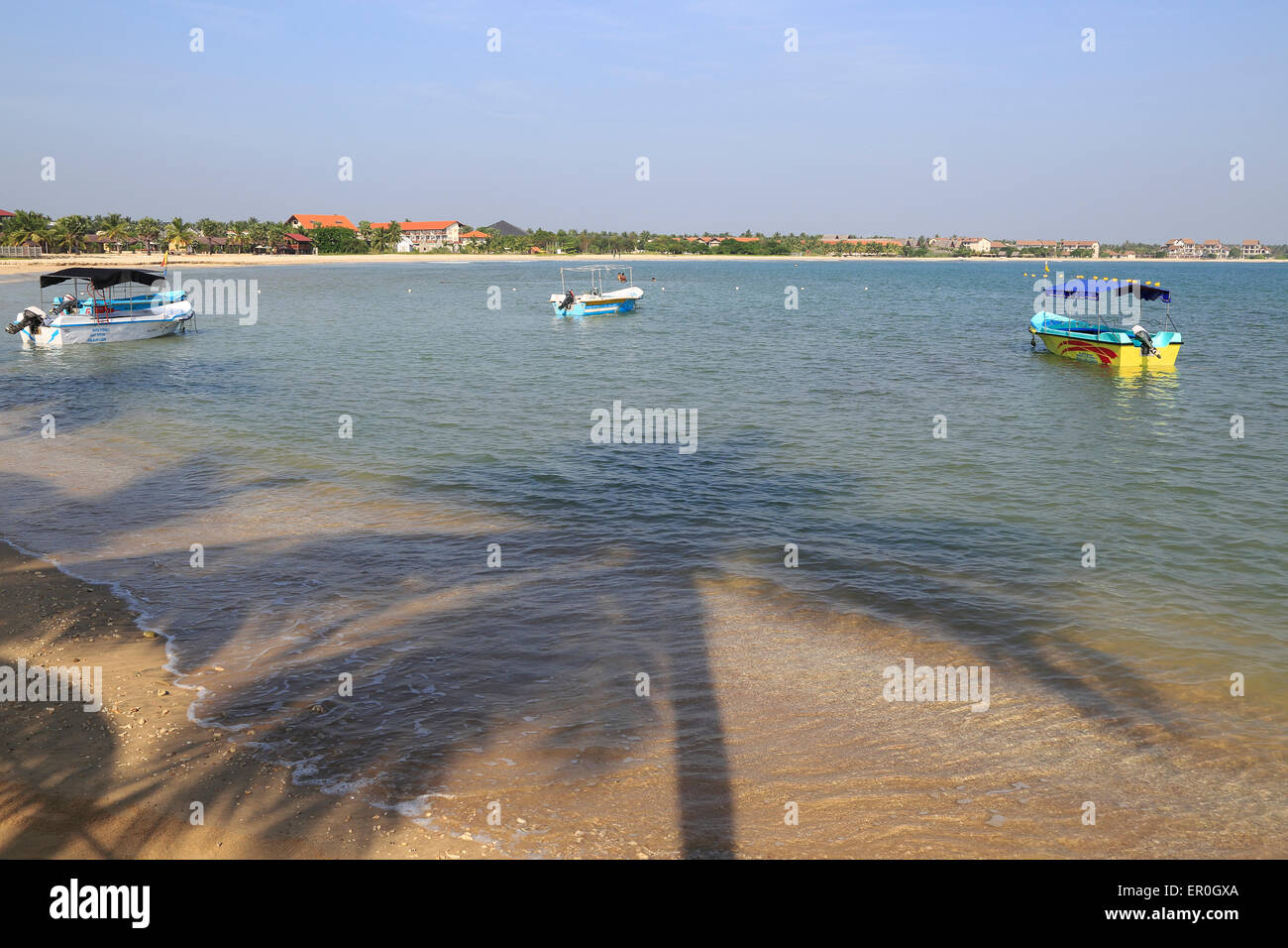 Ocean and sandy tropical beach at Pasikudah Bay, Eastern Province, Sri ...