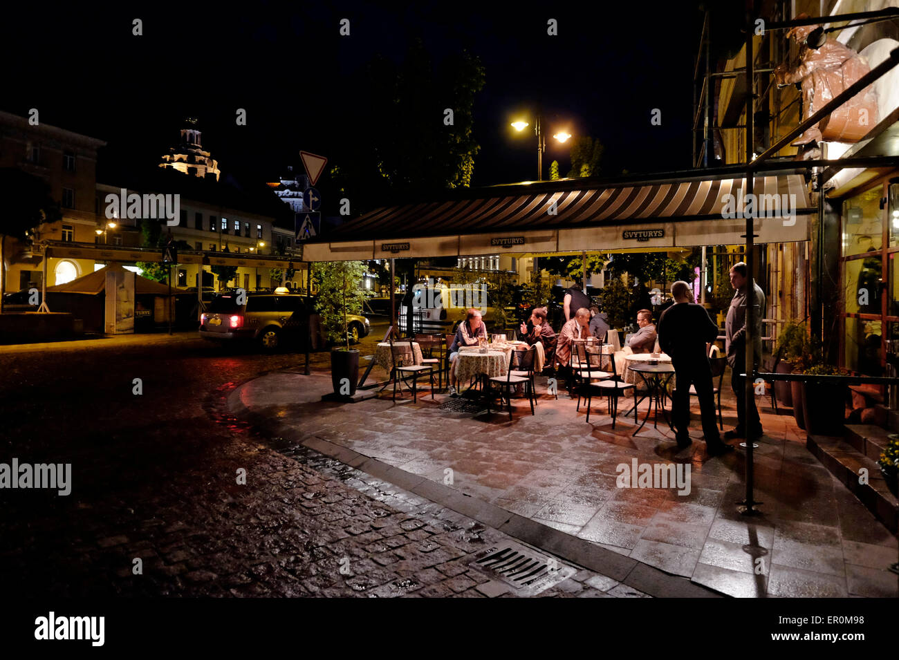Street scene at night in the old city of Vilnius the capital of ...