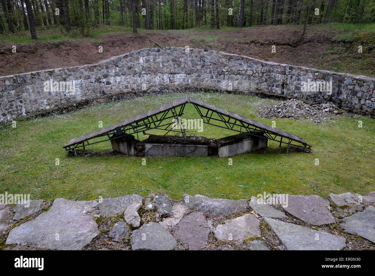 An excavated pit used to cremate corpses at the Ponary, now known as ...