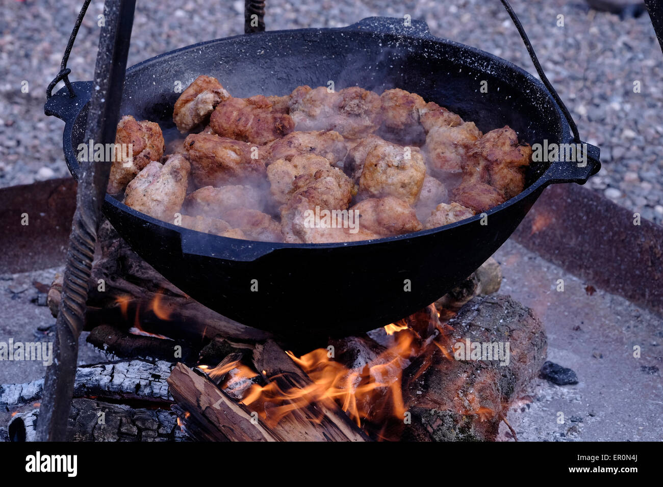 Traditional Zrazy meat roulade dish being cooked in large cast iron ...