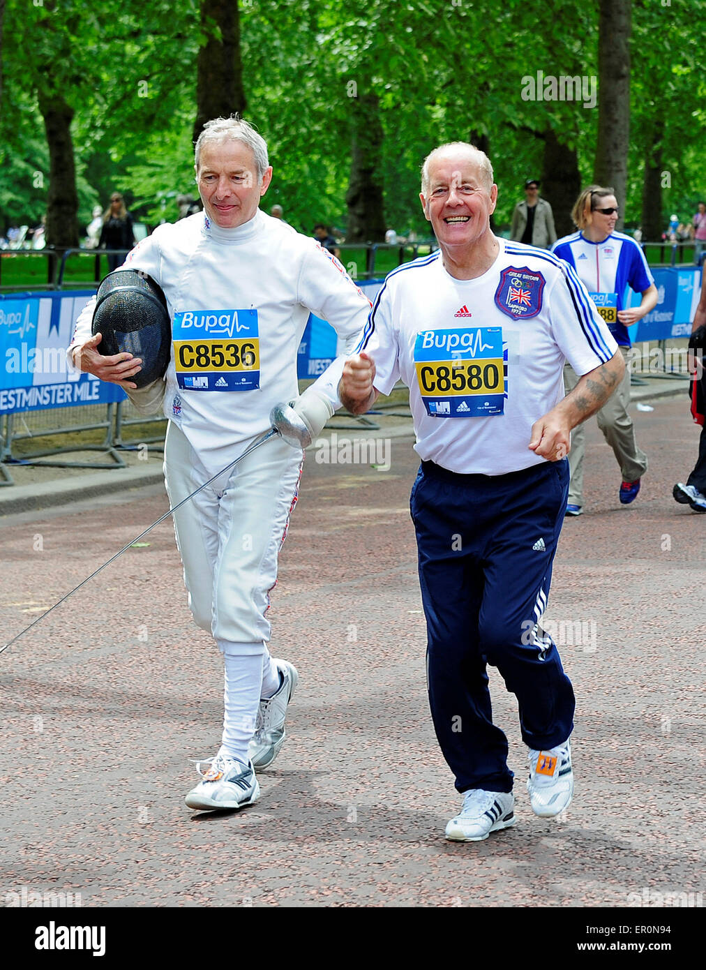 London, UK. 24th May, 2015. BUPA Westminster Mile. Olympic fencers in ...