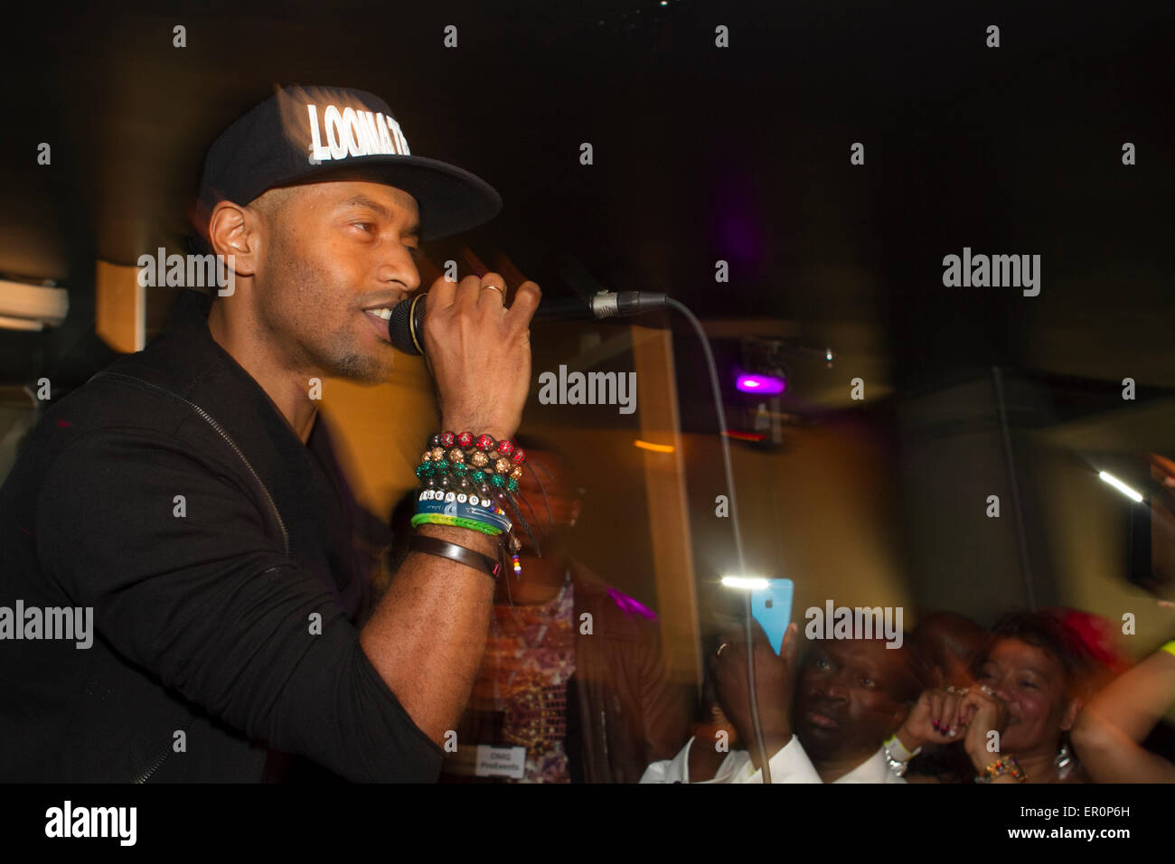 Loony Johnson kizomba singer performing in Manchester surrounded by ...