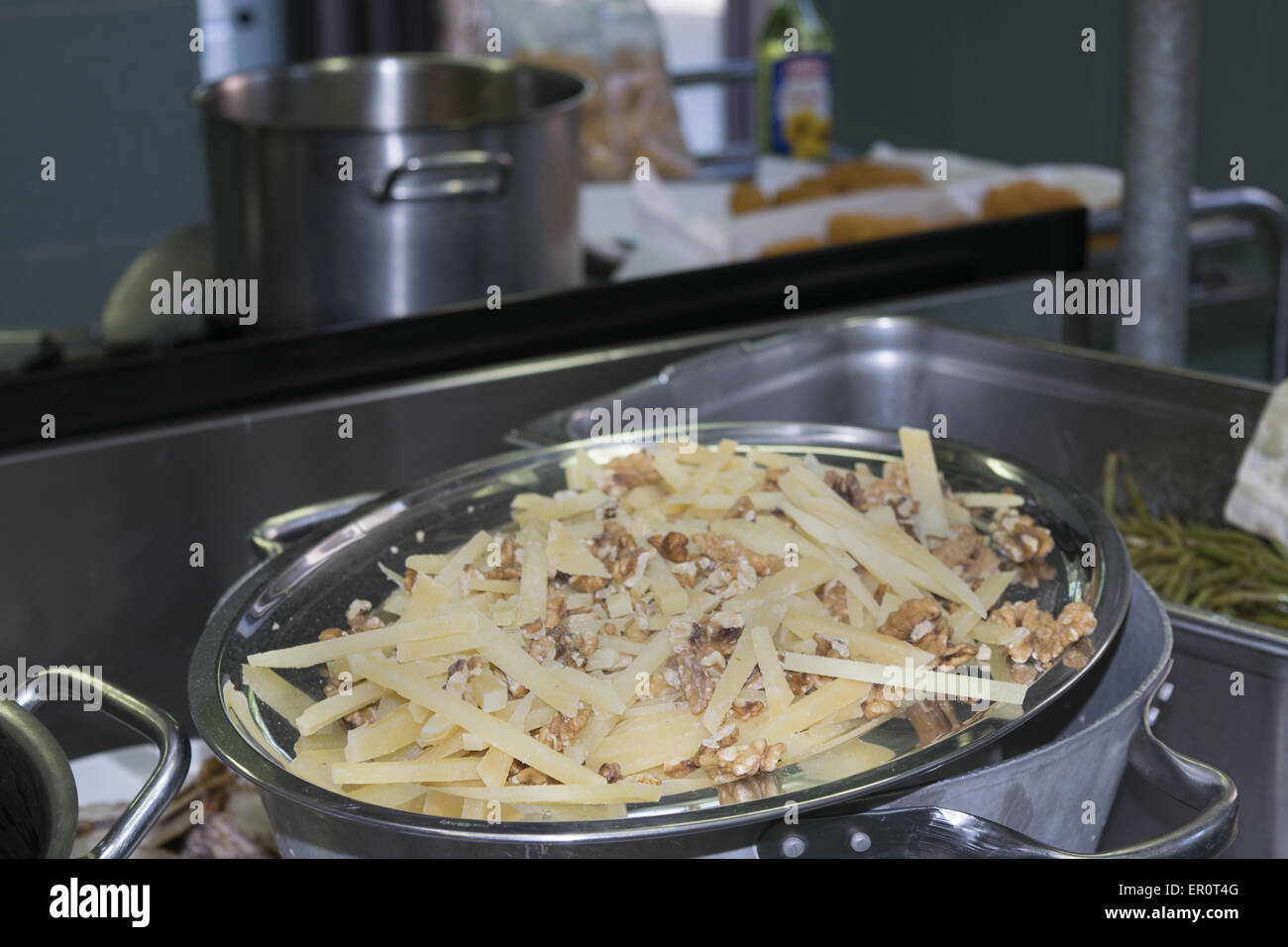 appetizer of sticks of parmesan cheese and kernels of walnuts Stock ...