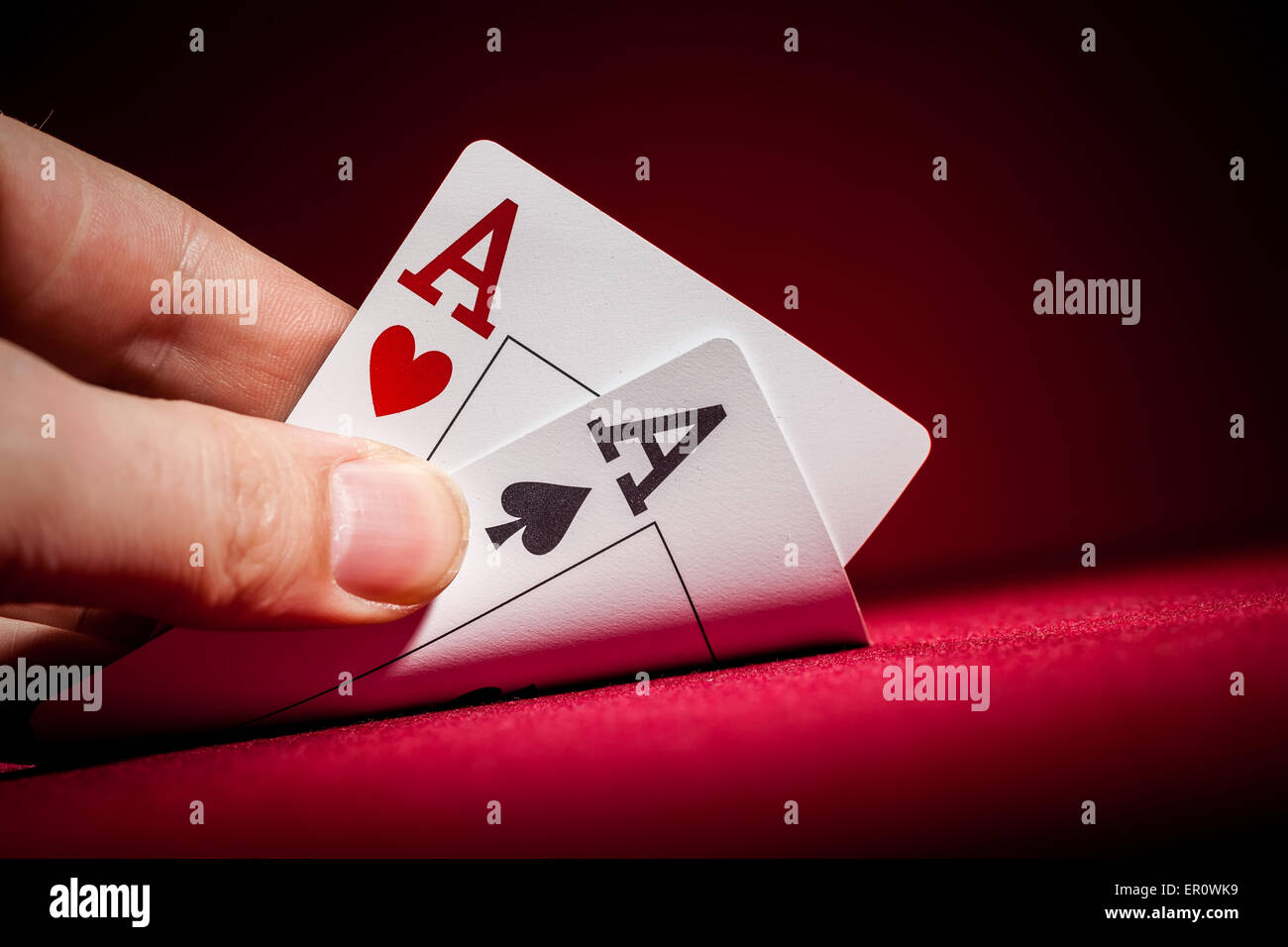 Pockets Aces with plenty of red background for textcopy Stock Photo - Alamy
