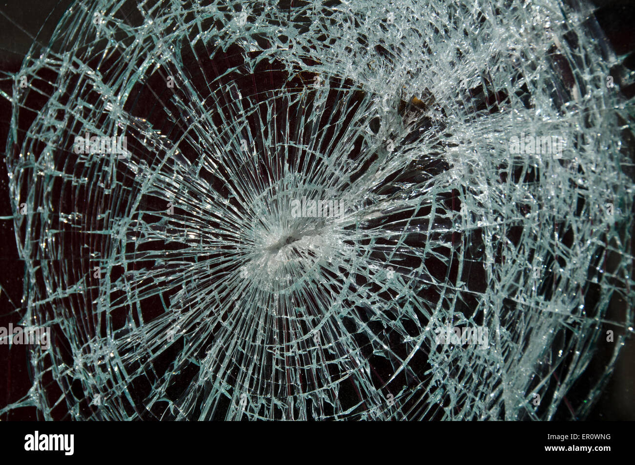 Broken laminated shop window glass Stock Photo - Alamy