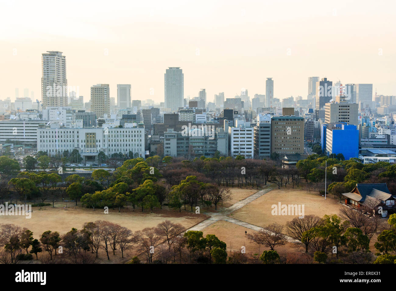 Early morning golden hour view across Osaka city with Osaka jo park in ...