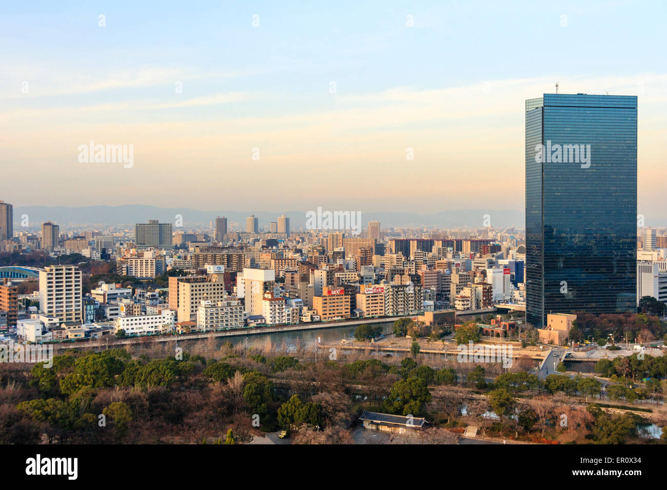 Early morning golden hour view across Osaka city with the Crystal Tower ...