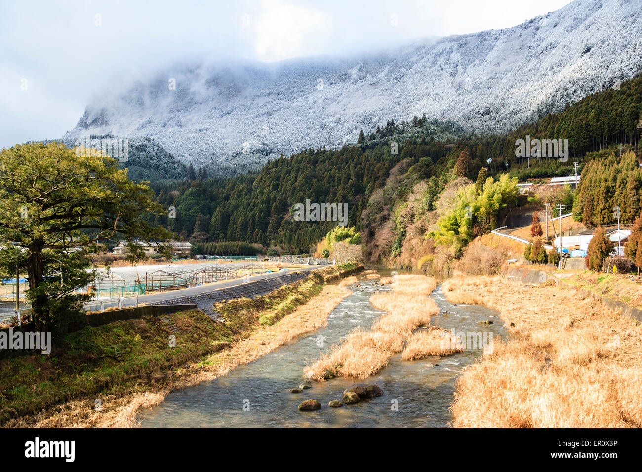 Wintertime at Soni in Japan. River running along road and through ...