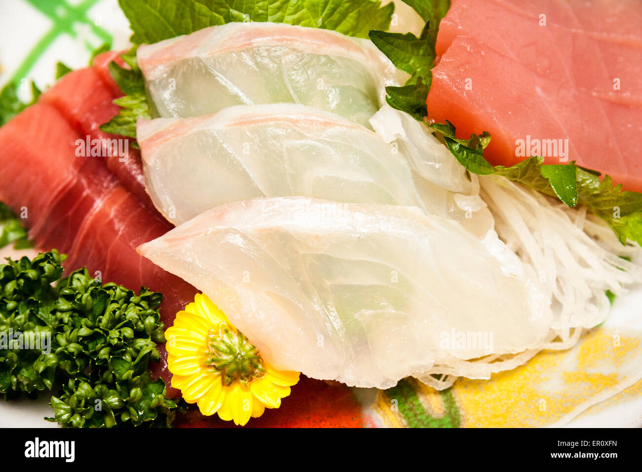 Thin slices fish hi-res stock photography and images - Alamy
