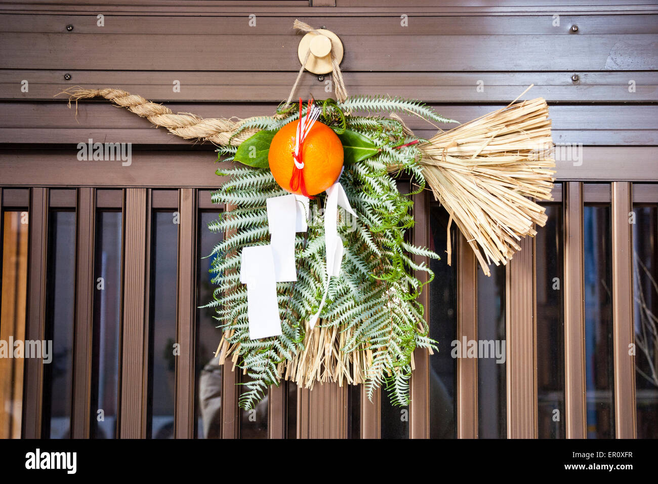 Typical new year decoration, Shimekazari, placed by exterior doors in ...