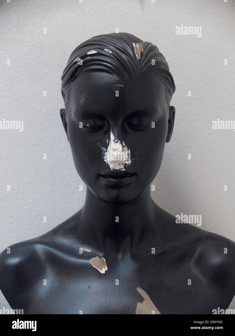 Broken dummy from a fashion boutique and left in the street Stock Photo ...