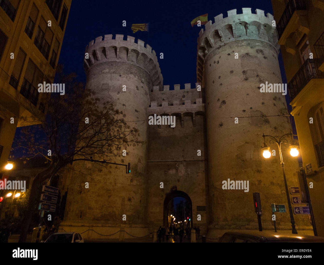 Night view of the ancient entrance gate of the city of Valencia, Spain ...