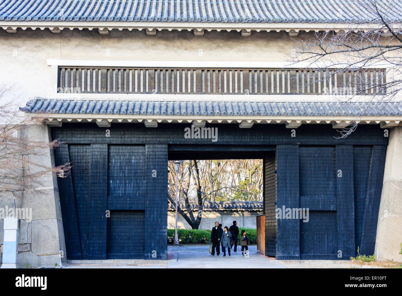 People walking through the inner Masugata Otemon gate at Osaka Castle ...