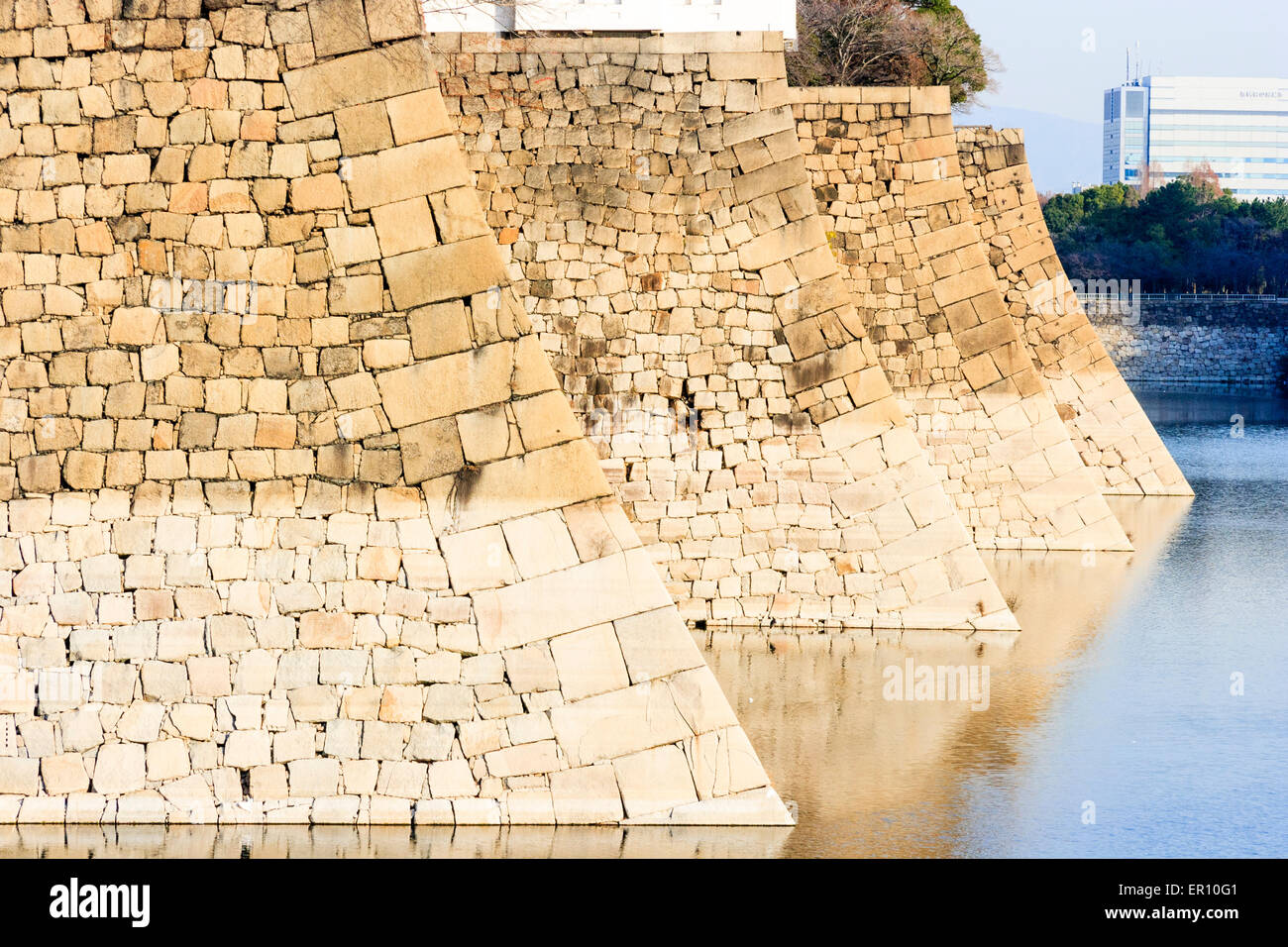 Osaka castle. High zig-zagging ishigaki stone walls of the ninomaru ...