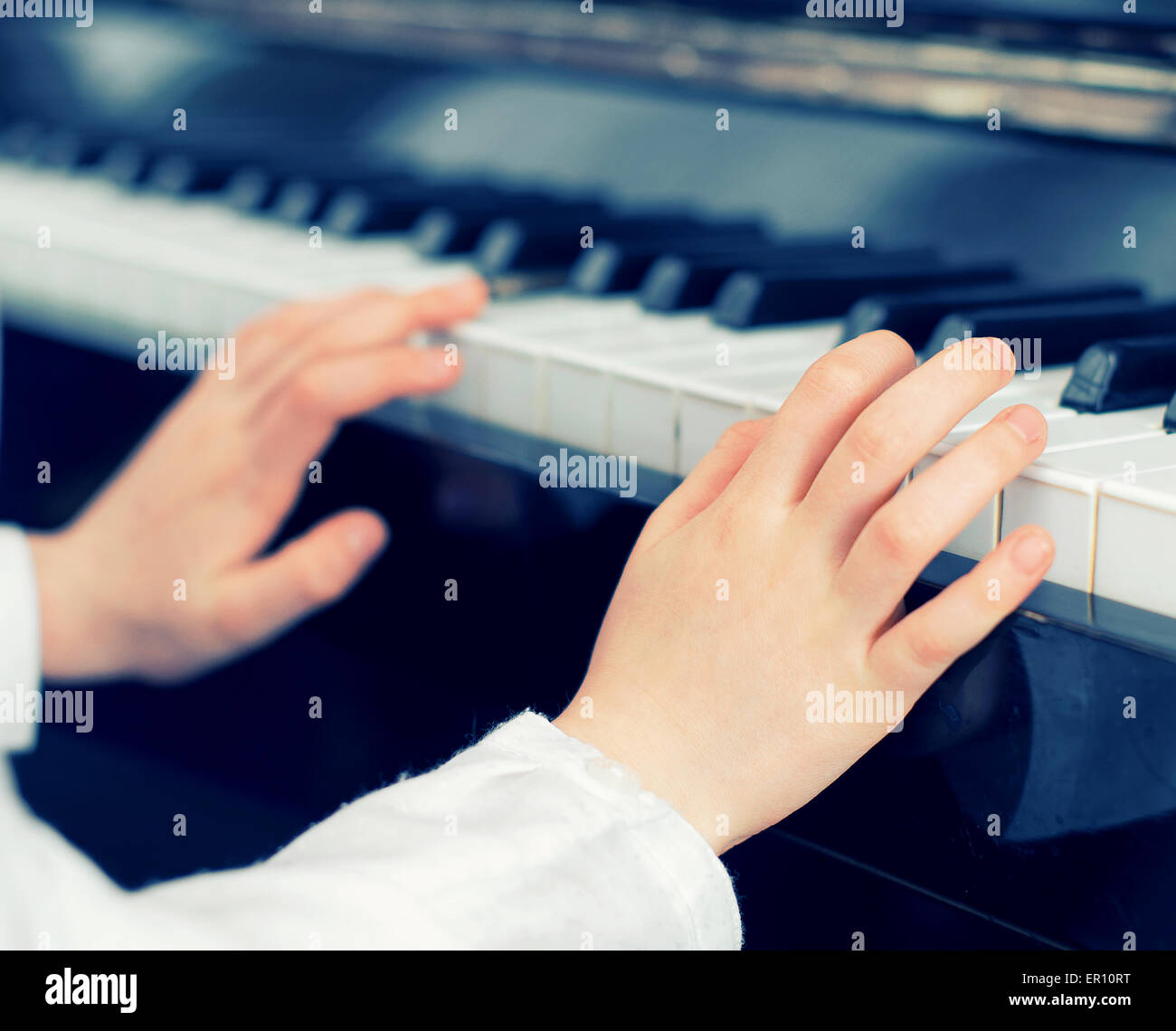 Vintage piano child hi-res stock photography and images - Alamy