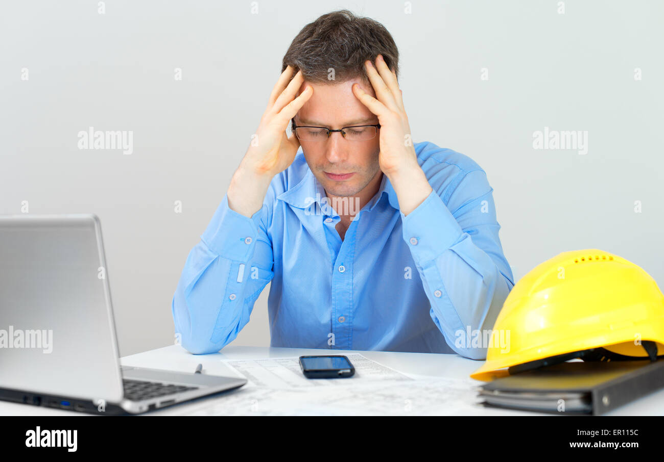 Male architect working at his workplace Stock Photo - Alamy