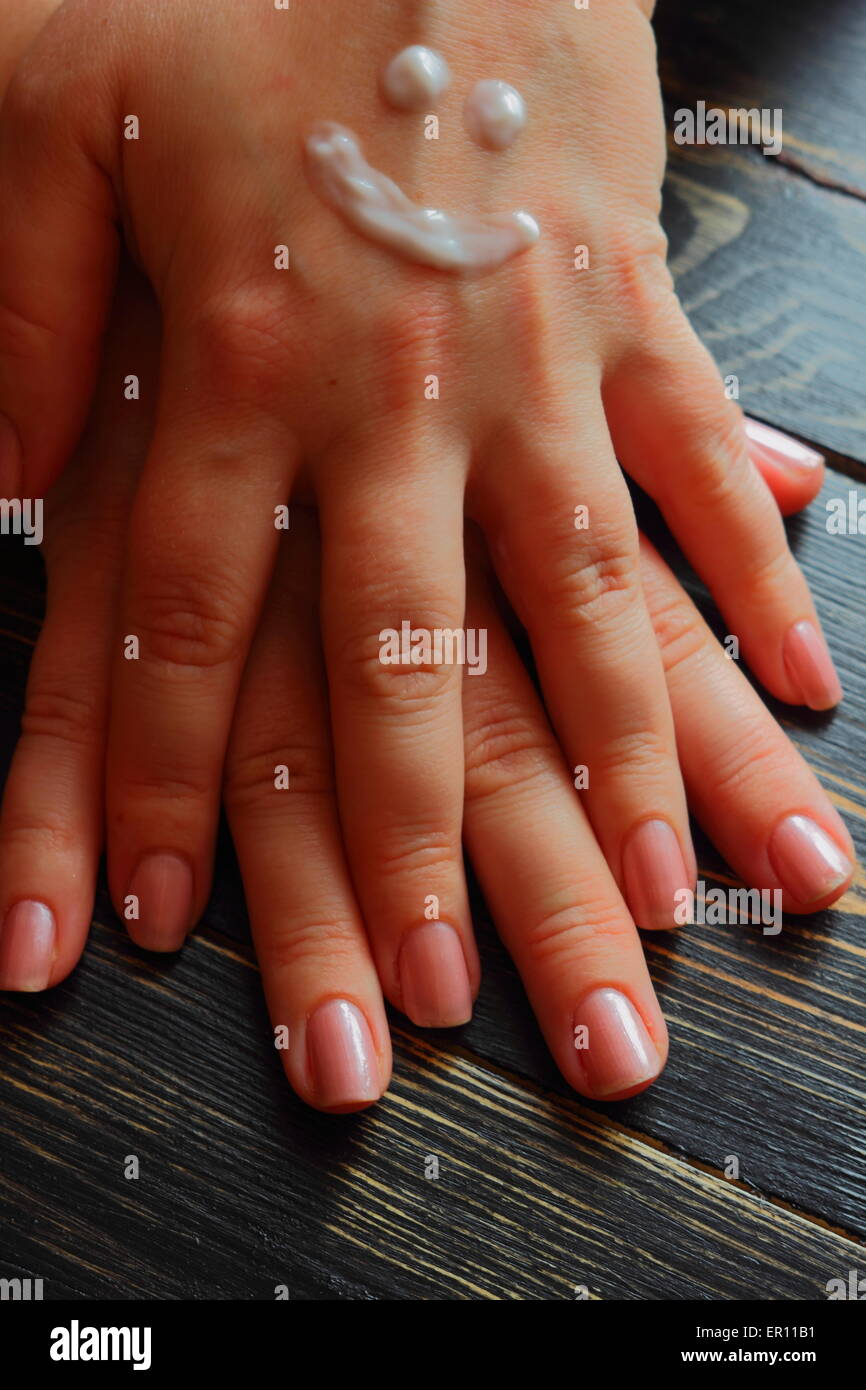 on the arm of a smiley face cream Stock Photo - Alamy