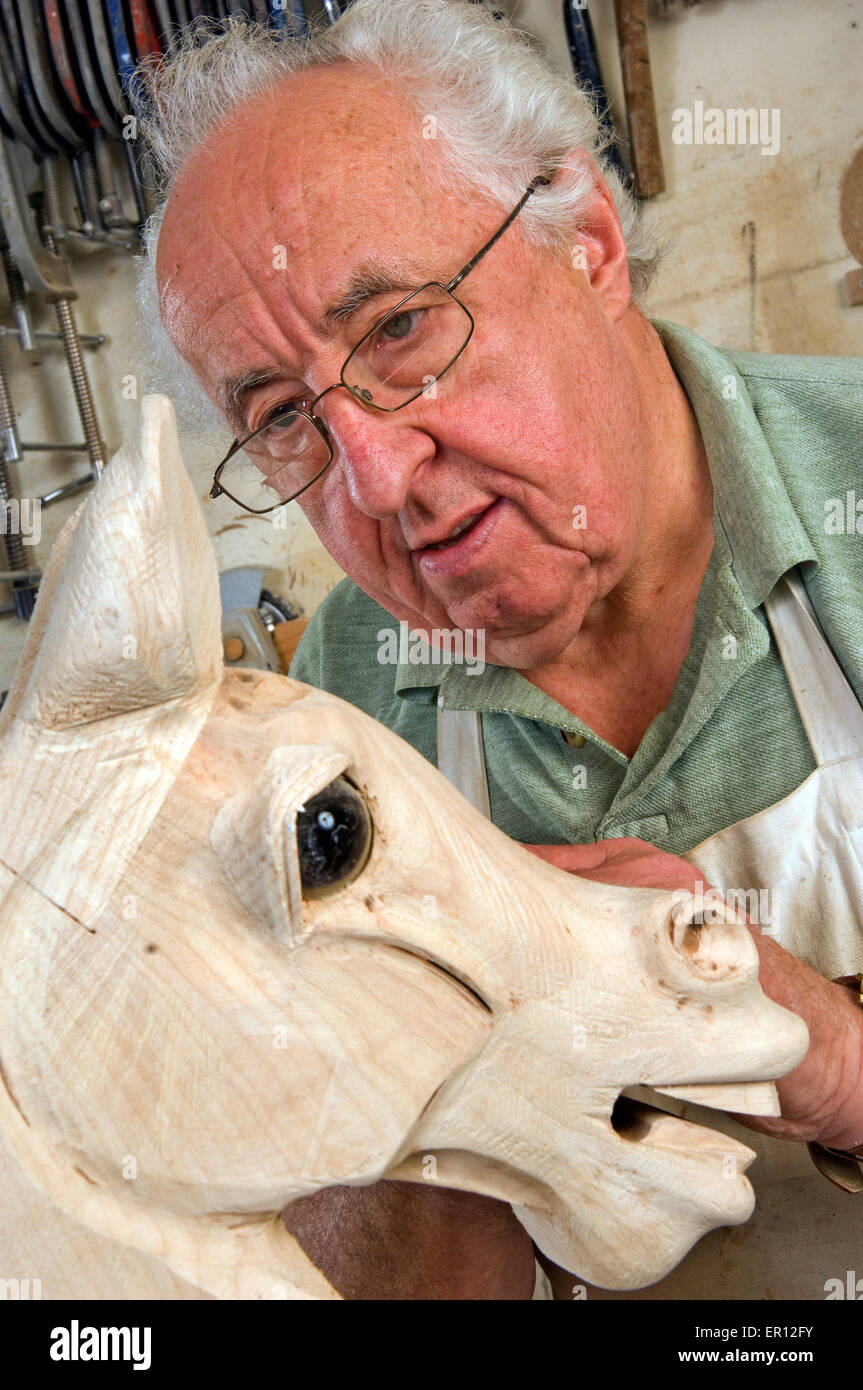 Craftsman Robert Mullis who makes and repairs traditional childrens ...