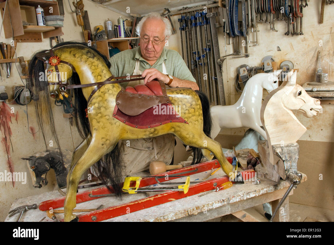 Craftsman Robert Mullis who makes and repairs traditional childrens ...