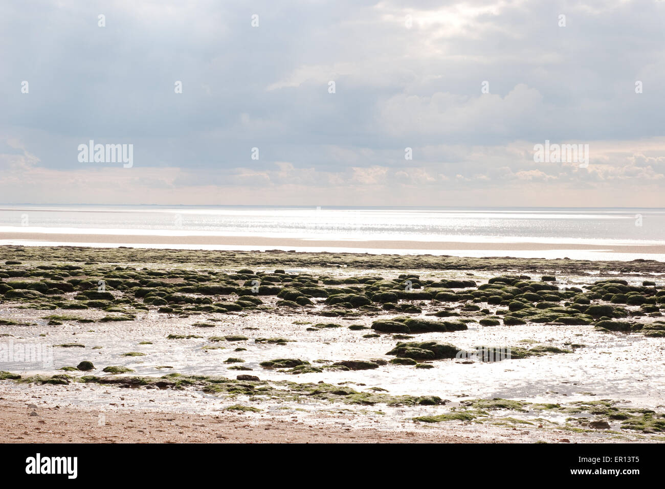 The beach at Hunstanton, Norfolk at low tide, exposing large rocks ...