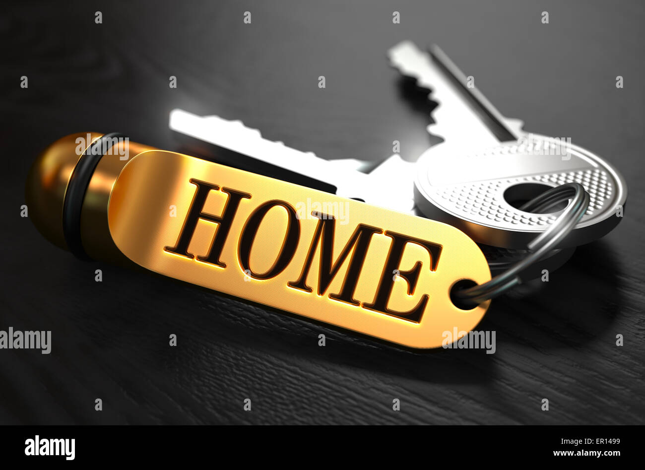 Keys with Word 'Home' on Golden Label Stock Photo - Alamy