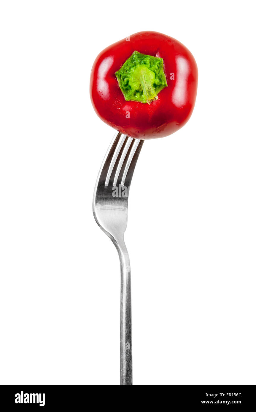 Small red pepper on a fork isolated on white background with clipping ...