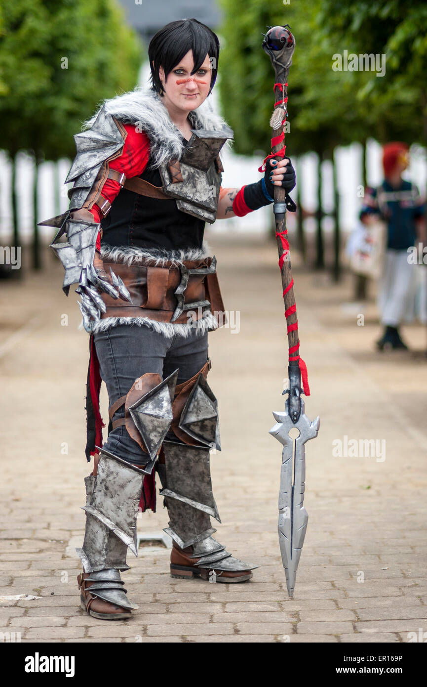 London, UK. 24 May 2015. A cosplay character poses, as fans of comic ...