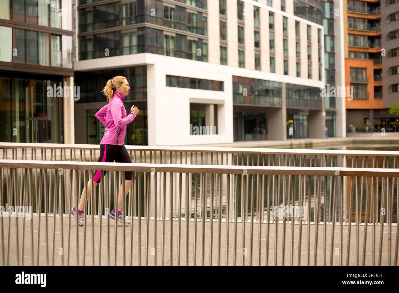 young woman out running Stock Photo - Alamy