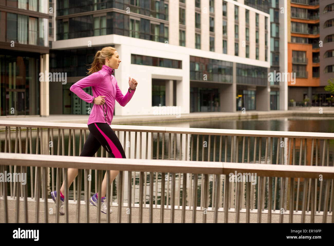 Woman out running hi-res stock photography and images - Alamy