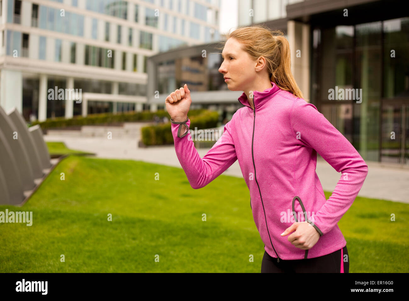 young woman running Stock Photo - Alamy