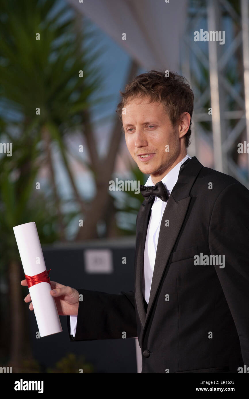 Cannes, France. 24th May, 2015. Laszlo Nemes with his Grand Prix award ...
