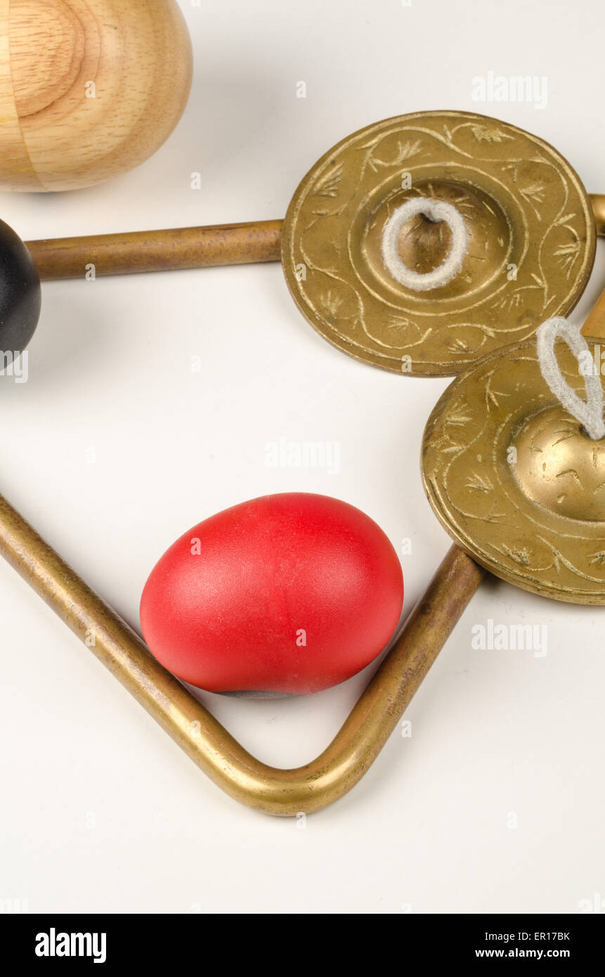 An assortment of small percussion instruments on white Stock Photo - Alamy