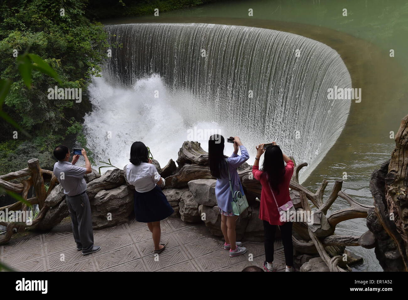 Libo, China's Guizhou Province. 24th May, 2015. People take photos of a ...
