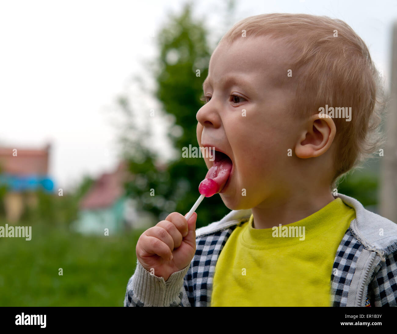 Boy blond outdoors street hi-res stock photography and images - Alamy