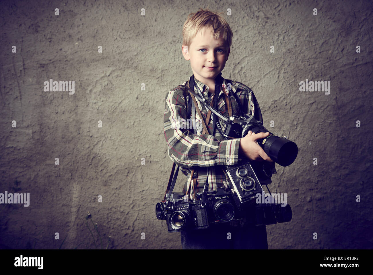 Child boy with Vintage photo film retro camera photographing and many ...